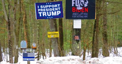 Property owner agrees to take down F-word sign