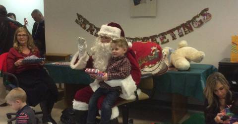 Santa visits Reverend Brown Preschoolers