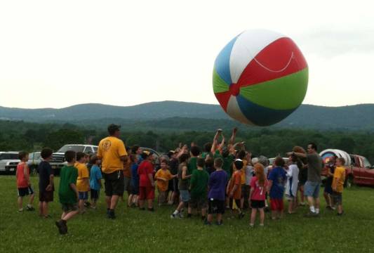Cub fun with giant beach ball