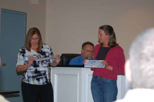 Check presented to alonso family