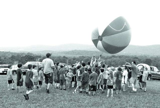 Cub fun with giant beach ball